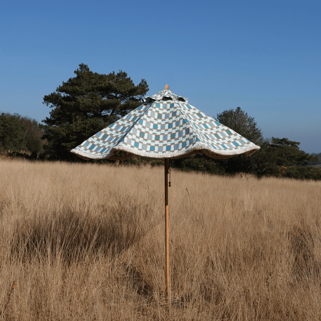 Christopher Farr Lapaz parasol with fringe – Plia Parasols